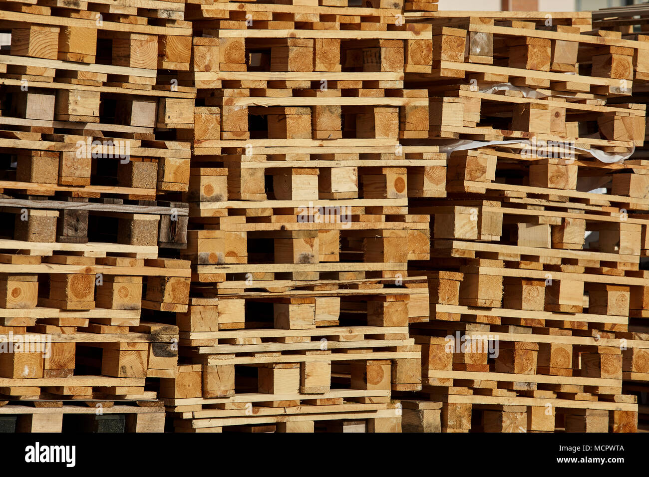 Stack of pallets outdoors Stock Photo - Alamy