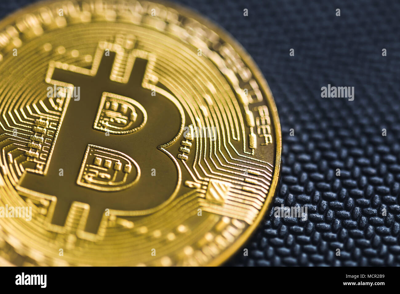 Bitcoin logo in the dark background Stock Photo - Alamy