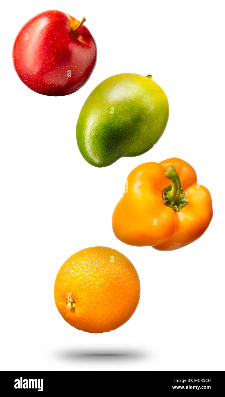 Falling fruits and vegetables on white background Stock Photo - Alamy