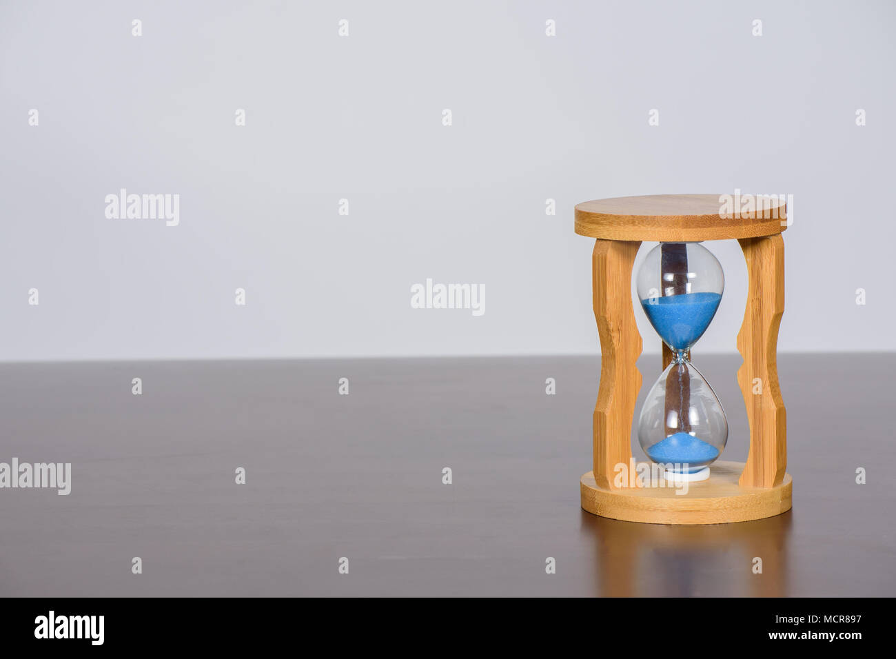 Sand timer table hi-res stock photography and images - Alamy