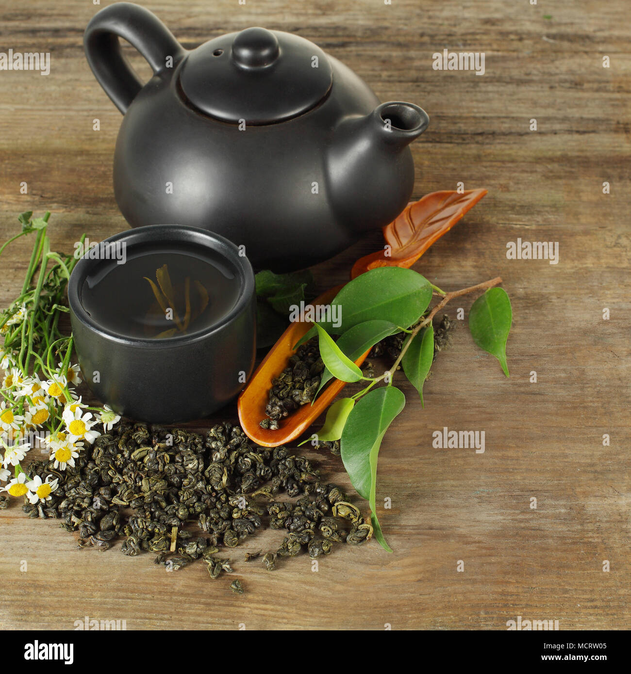 Tea - cup, teapot, leaves Stock Photo - Alamy