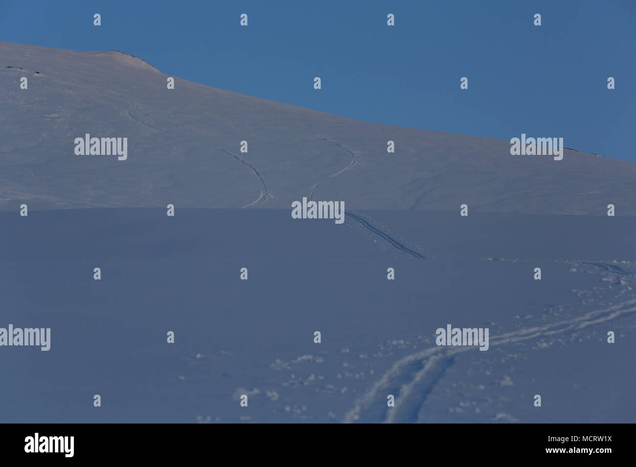Ski Tracks In The Snow, Mountain Stock Photo - Alamy