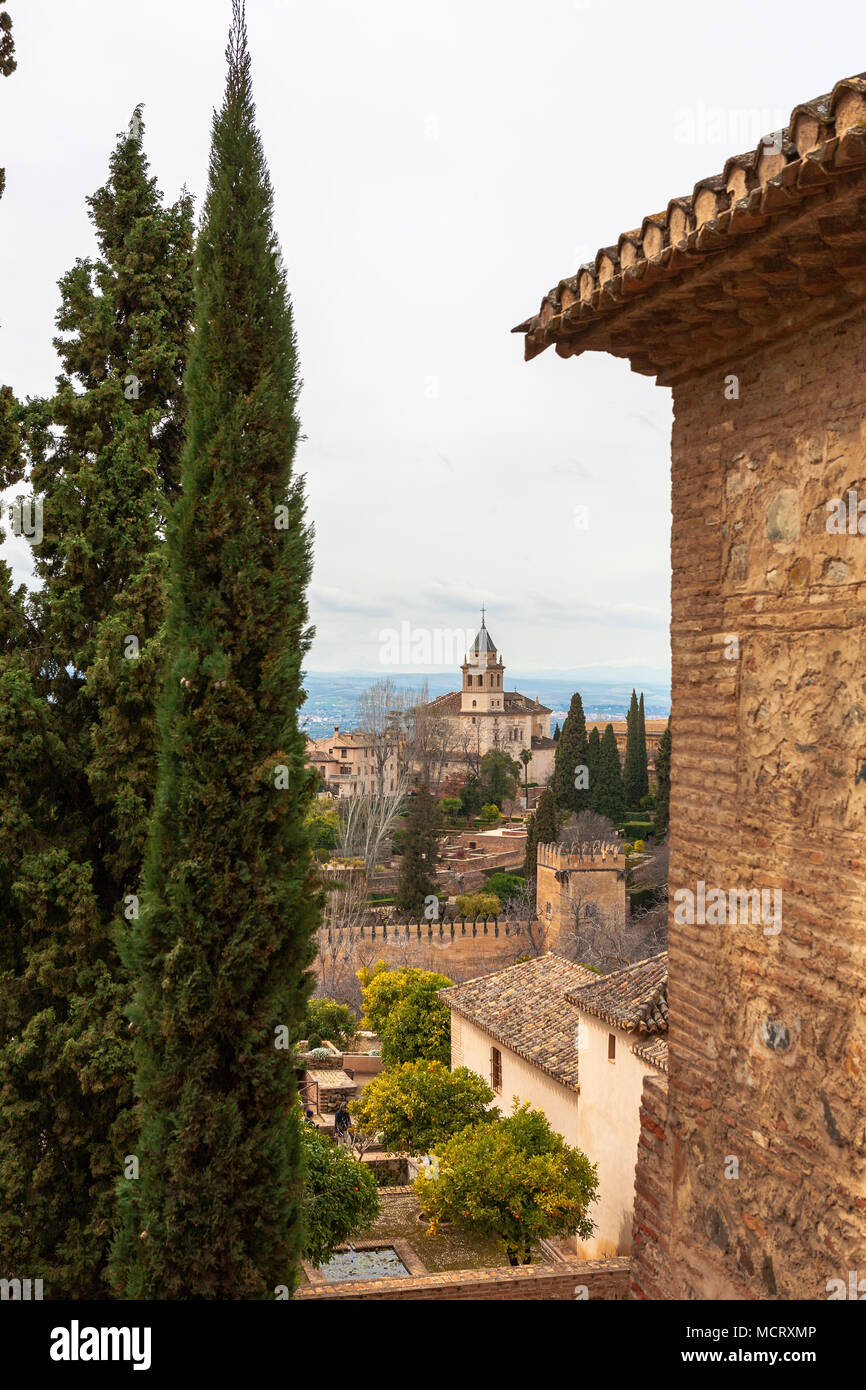 Glimpse of the tower of the Iglesia de Santa María, la Alhambra, from ...