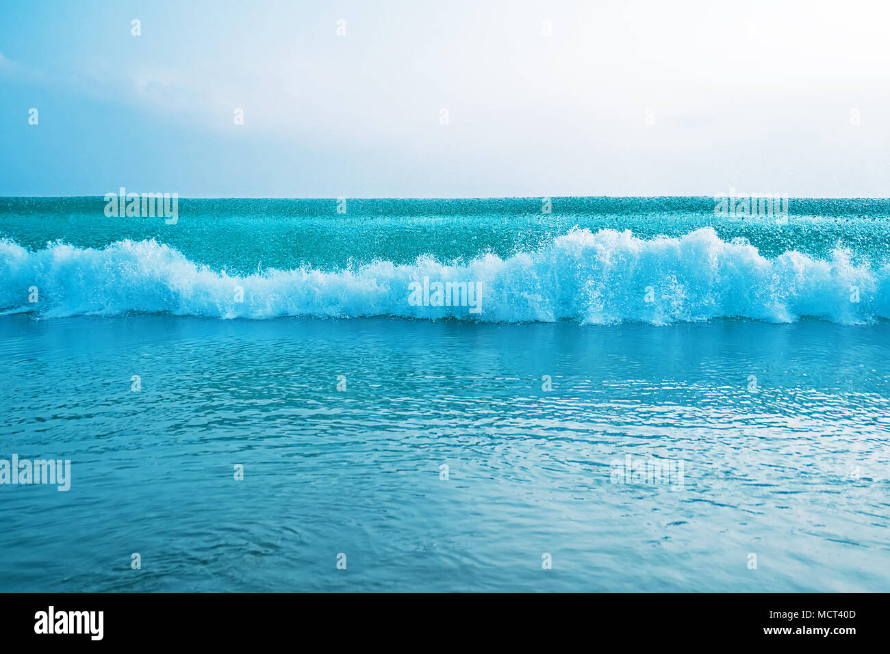 Looking at a barreling wave break in an empty line up Stock Photo - Alamy
