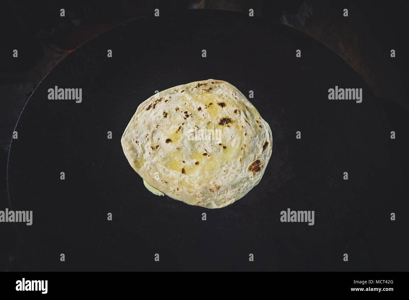 Paratha. Plain Wheaten Flat Bread Isolated on black Background Top View ...