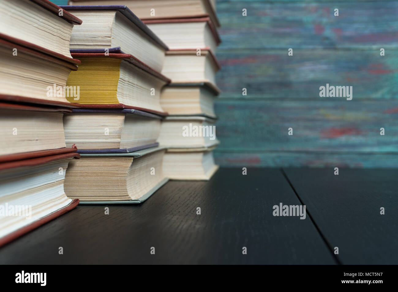 Many books in a bookstore or library Stock Photo - Alamy