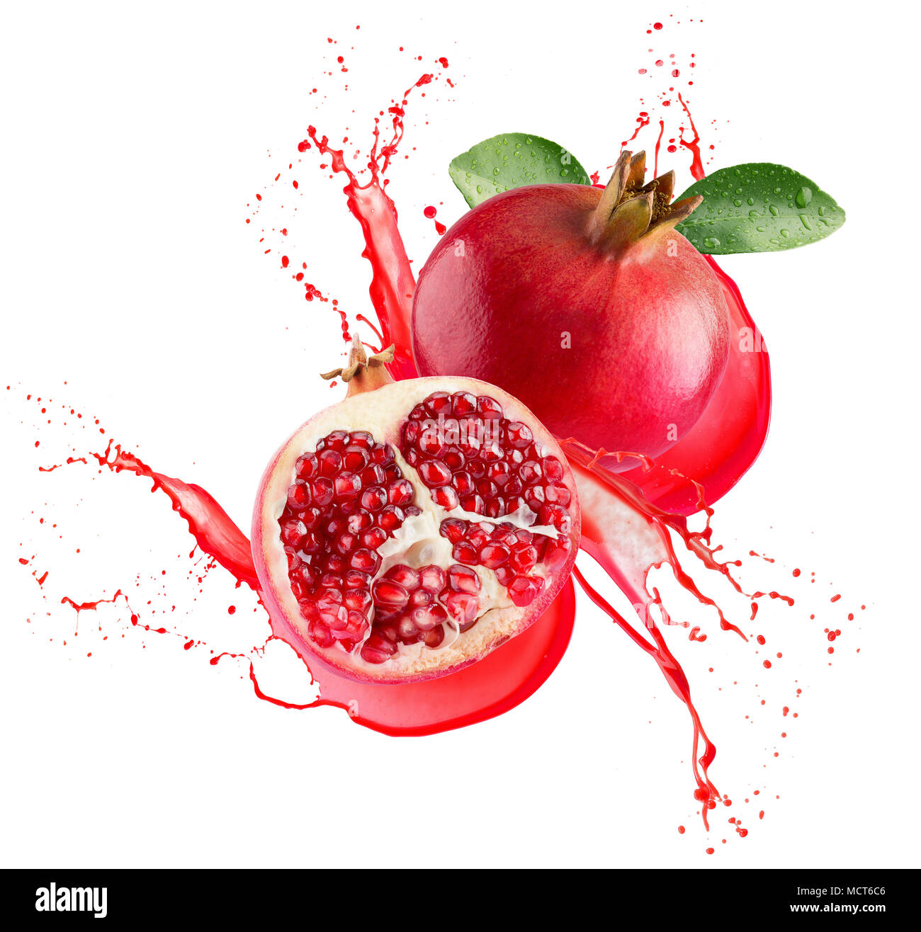 pomegranates in juice splash isolated on a white background Stock Photo ...