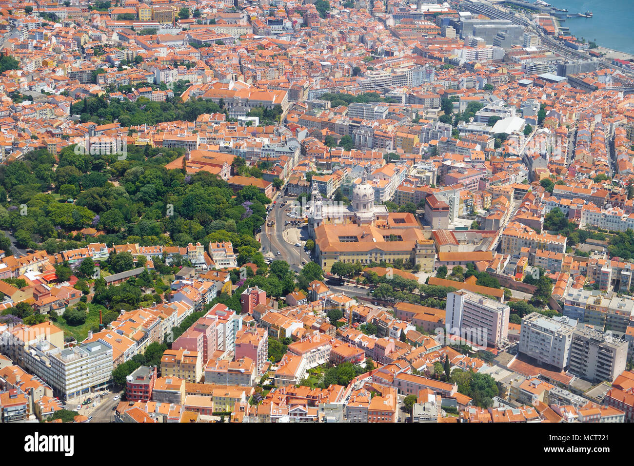 The plane is landing over the Estrela Basilica (Basilica da Estrela ...