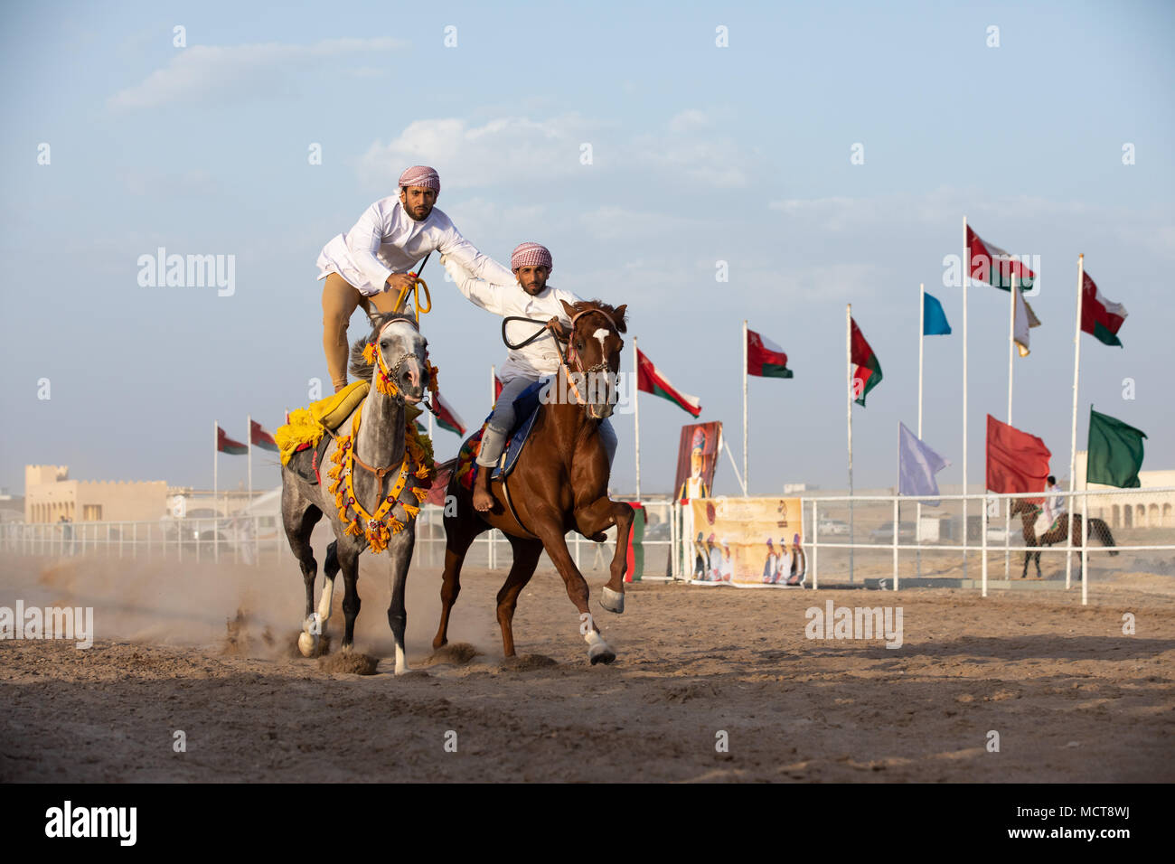 Nizwa, Oman - Apr 13, 2018: Brave Omani men showing off their acrobatic ...