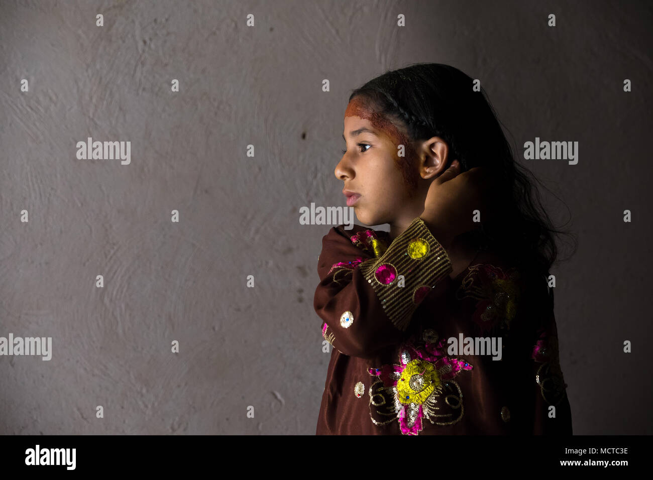Nizwa, Oman - Mar 23, 2018: A solitary young Omani girl with ...
