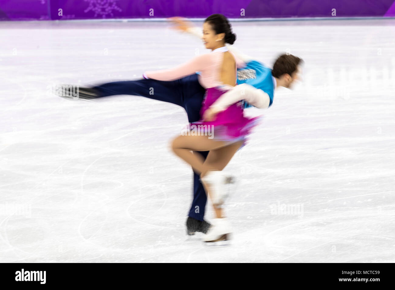 Motion blur action of Yura Min/Alexander Gamelin (KOR) in the Figure ...