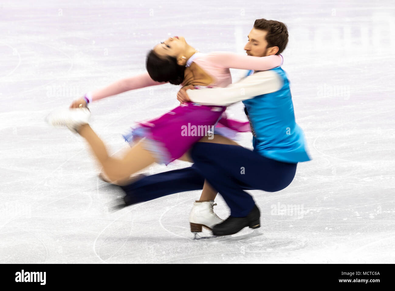 Motion blur action of Yura Min/Alexander Gamelin (KOR) in the Figure ...