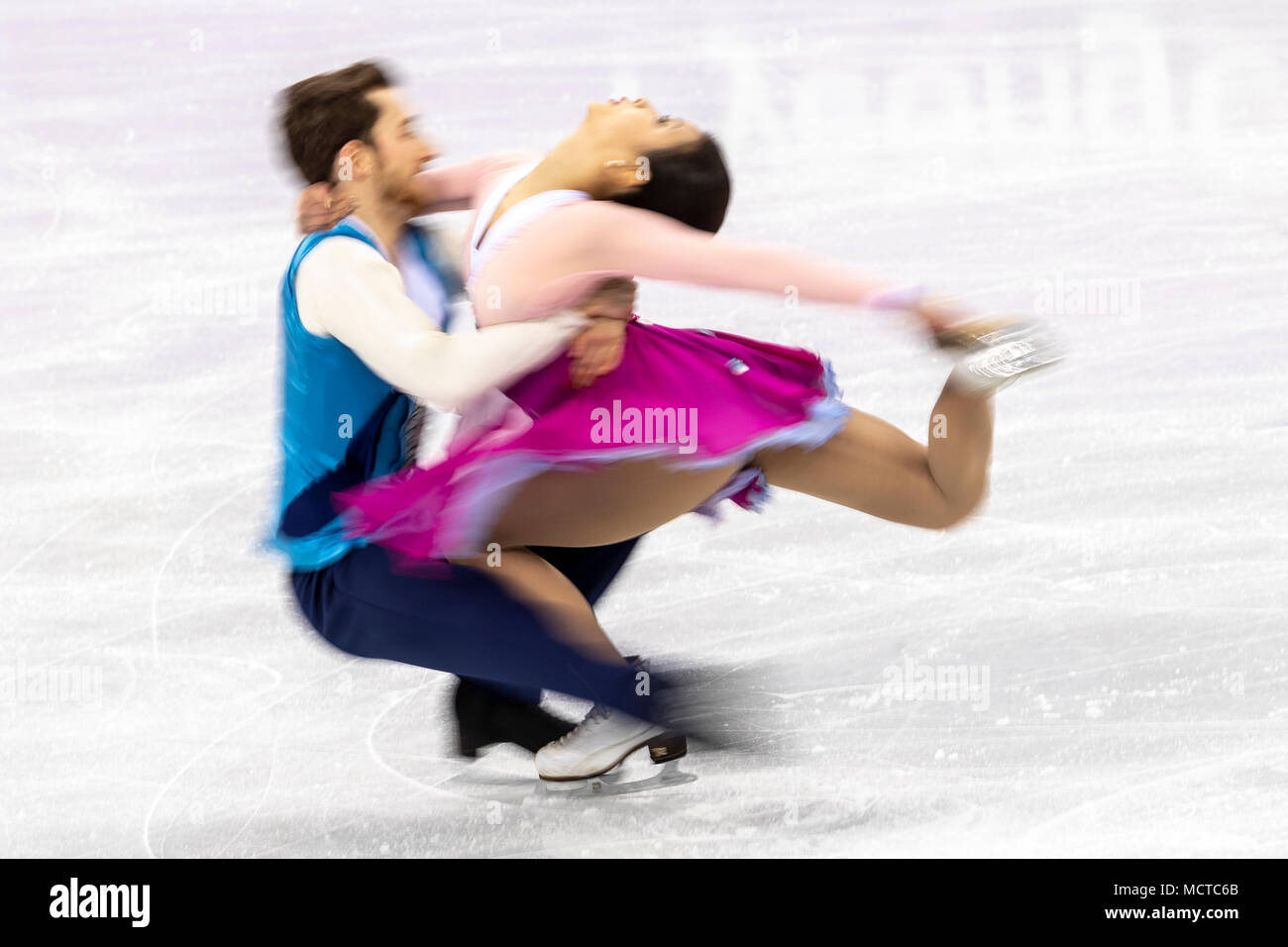 Motion blur action of Yura Min/Alexander Gamelin (KOR) in the Figure ...