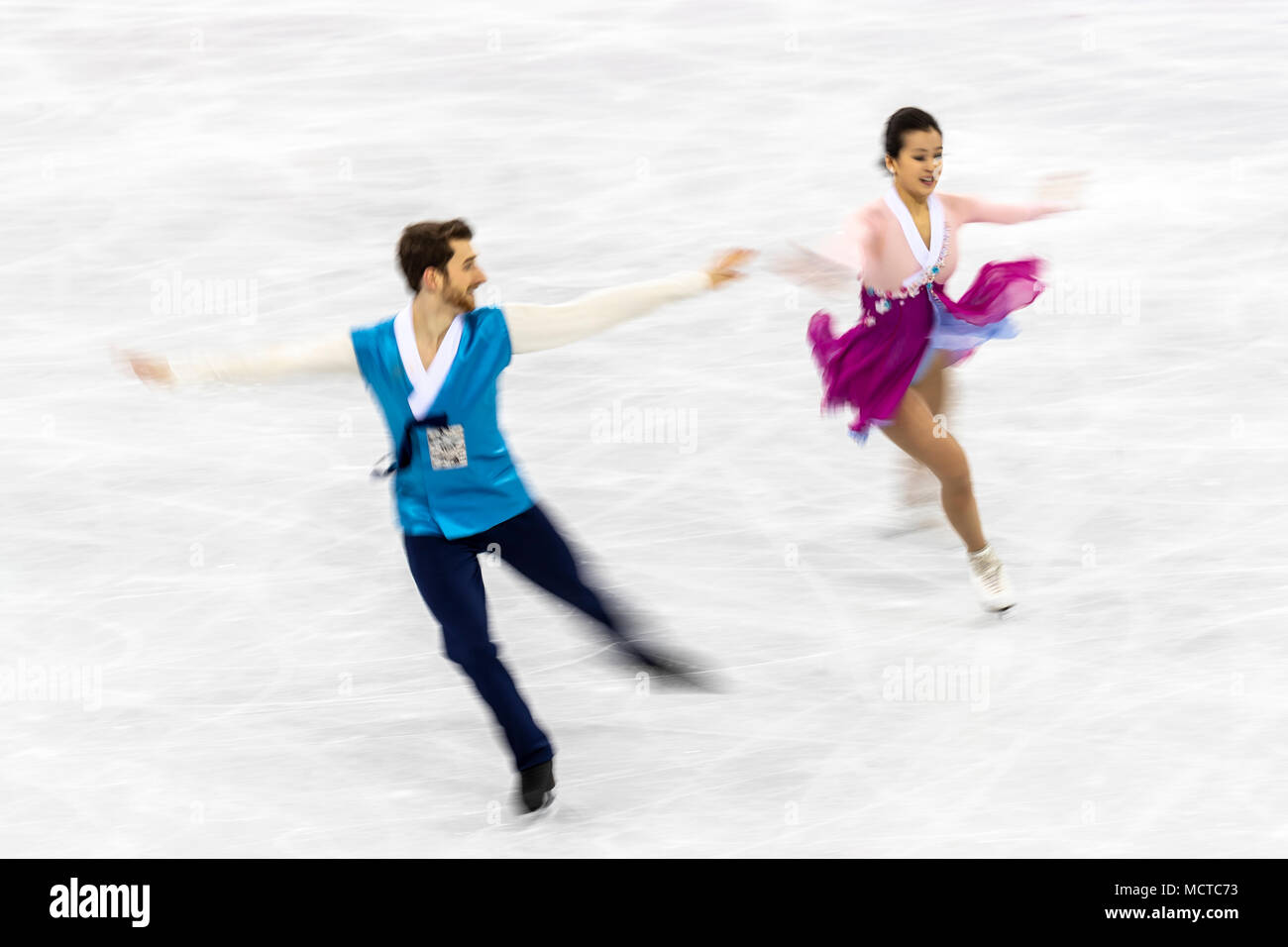 Motion blur action of Yura Min/Alexander Gamelin (KOR) in the Figure ...