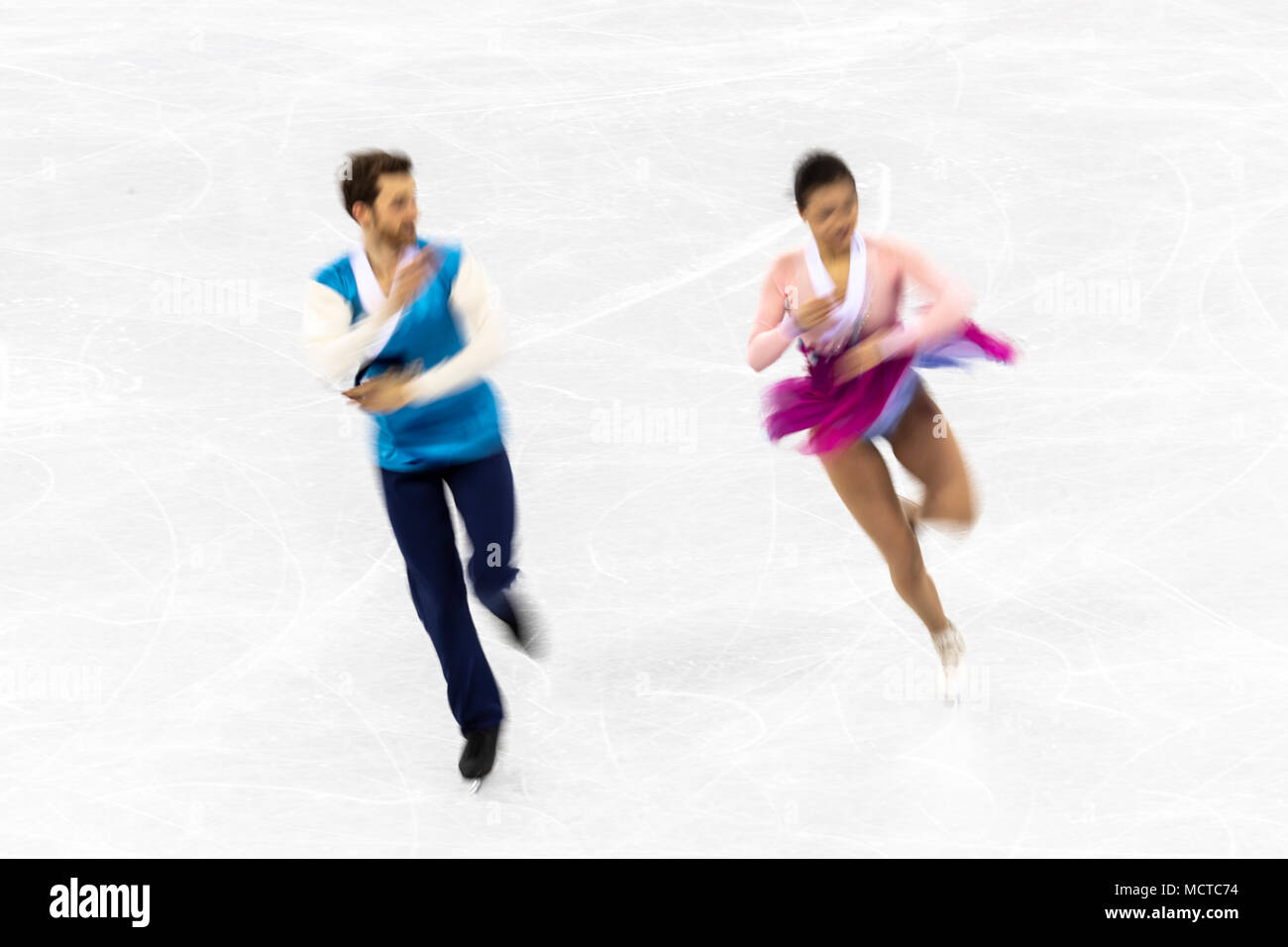 Motion blur action of Yura Min/Alexander Gamelin (KOR) in the Figure ...