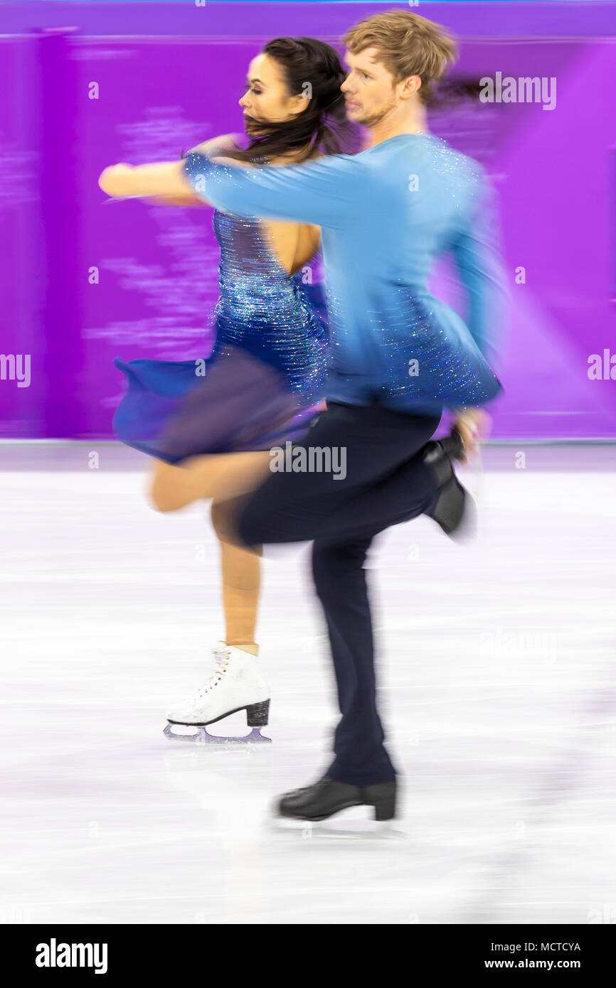 Motion blur action of Madison Chock/Evan Bates (USA) in the Figure ...