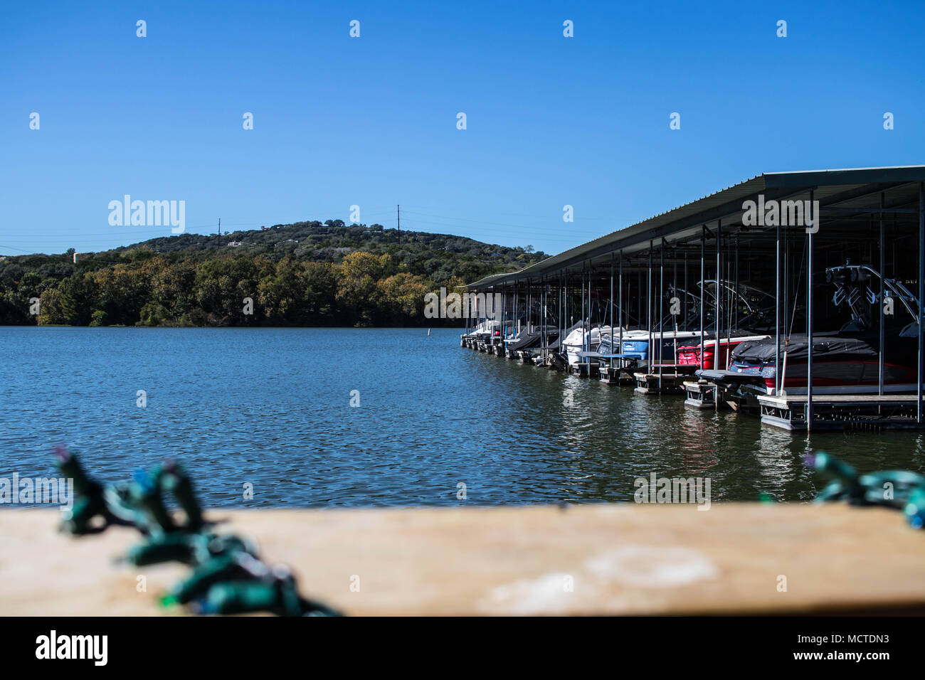 Small boat on riverfront hi-res stock photography and images - Alamy