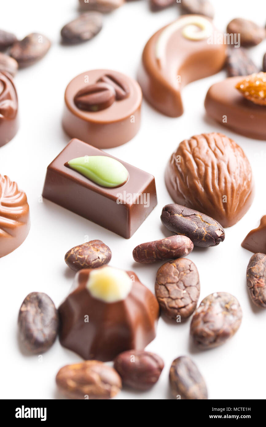 Mixed belgian pralines. Chocolate truffles isolated on white background ...