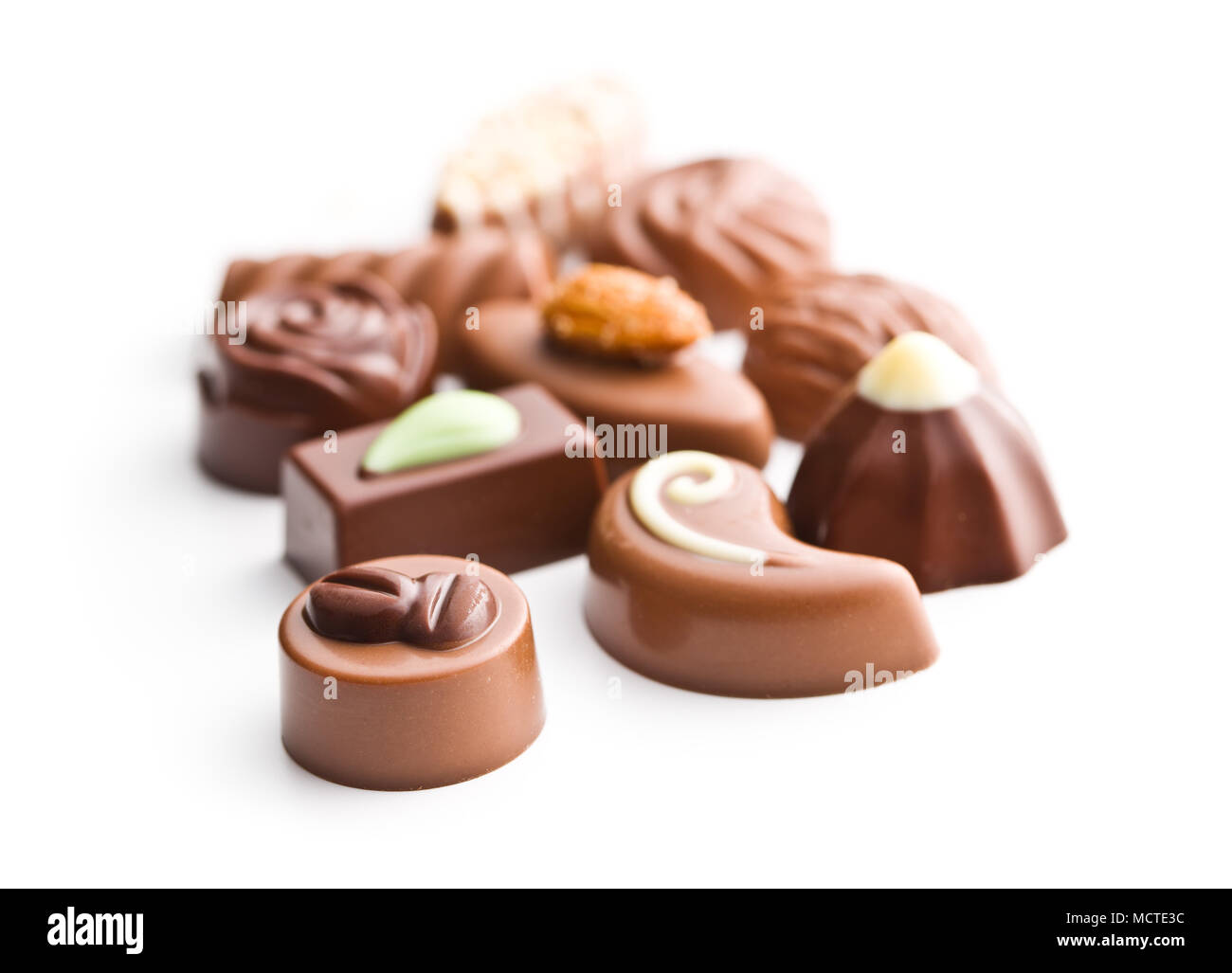Mixed belgian pralines. Chocolate truffles isolated on white background ...
