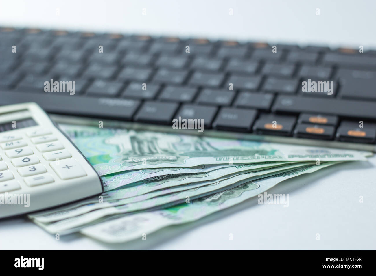 Form with pen, calculator and money Stock Photo - Alamy
