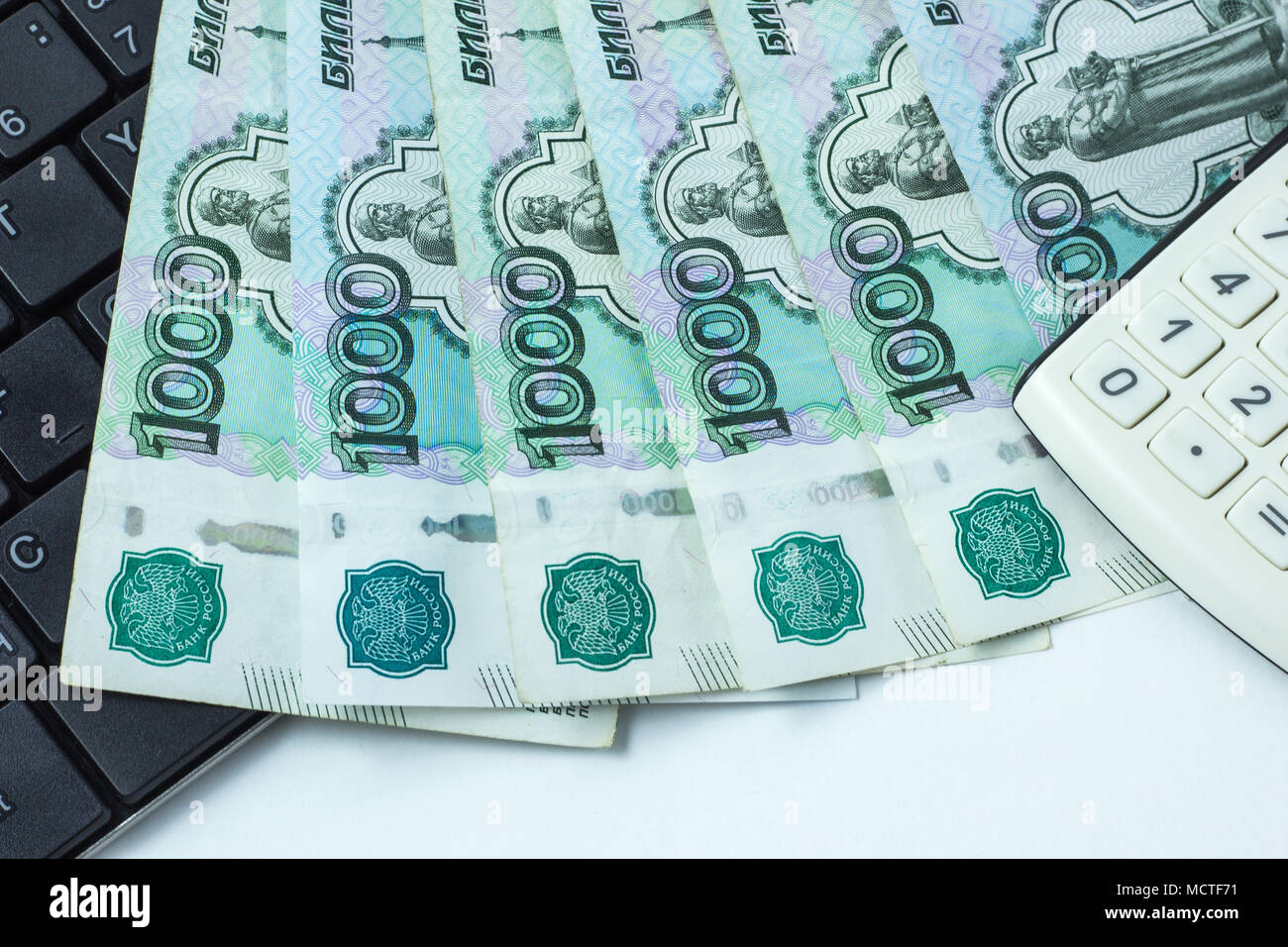 Form with pen, calculator and money Stock Photo - Alamy