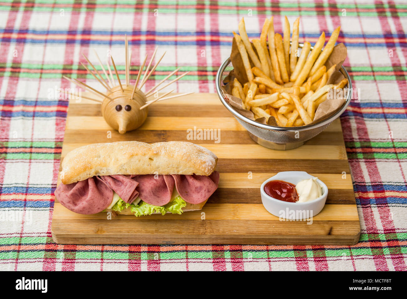 homemade ham sandwich with fried potatoes (French fries), ketchup and ...
