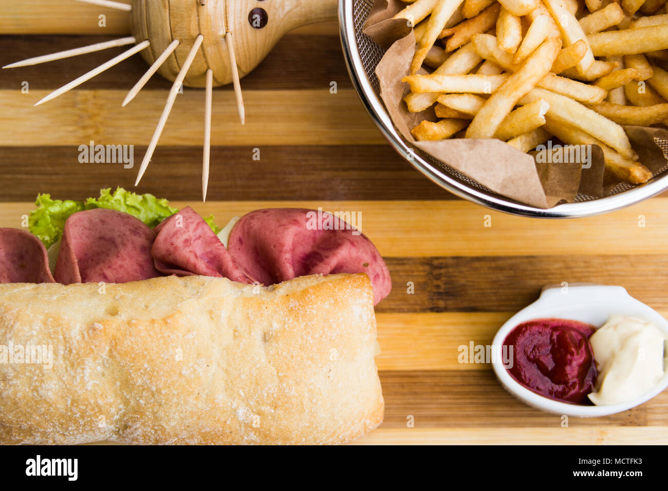 homemade ham sandwich with fried potatoes (French fries), ketchup and ...