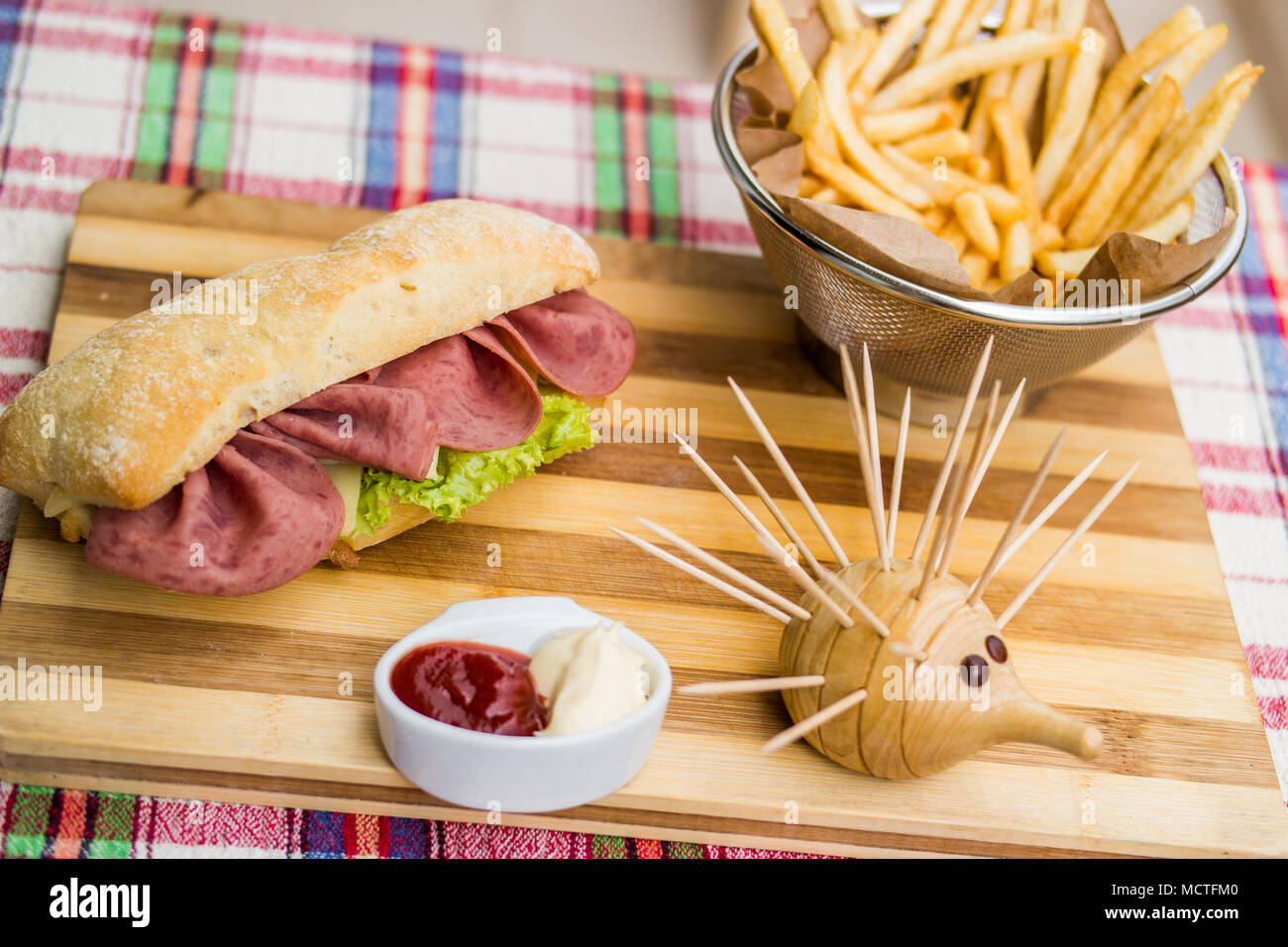 homemade ham sandwich with fried potatoes (French fries), ketchup and ...