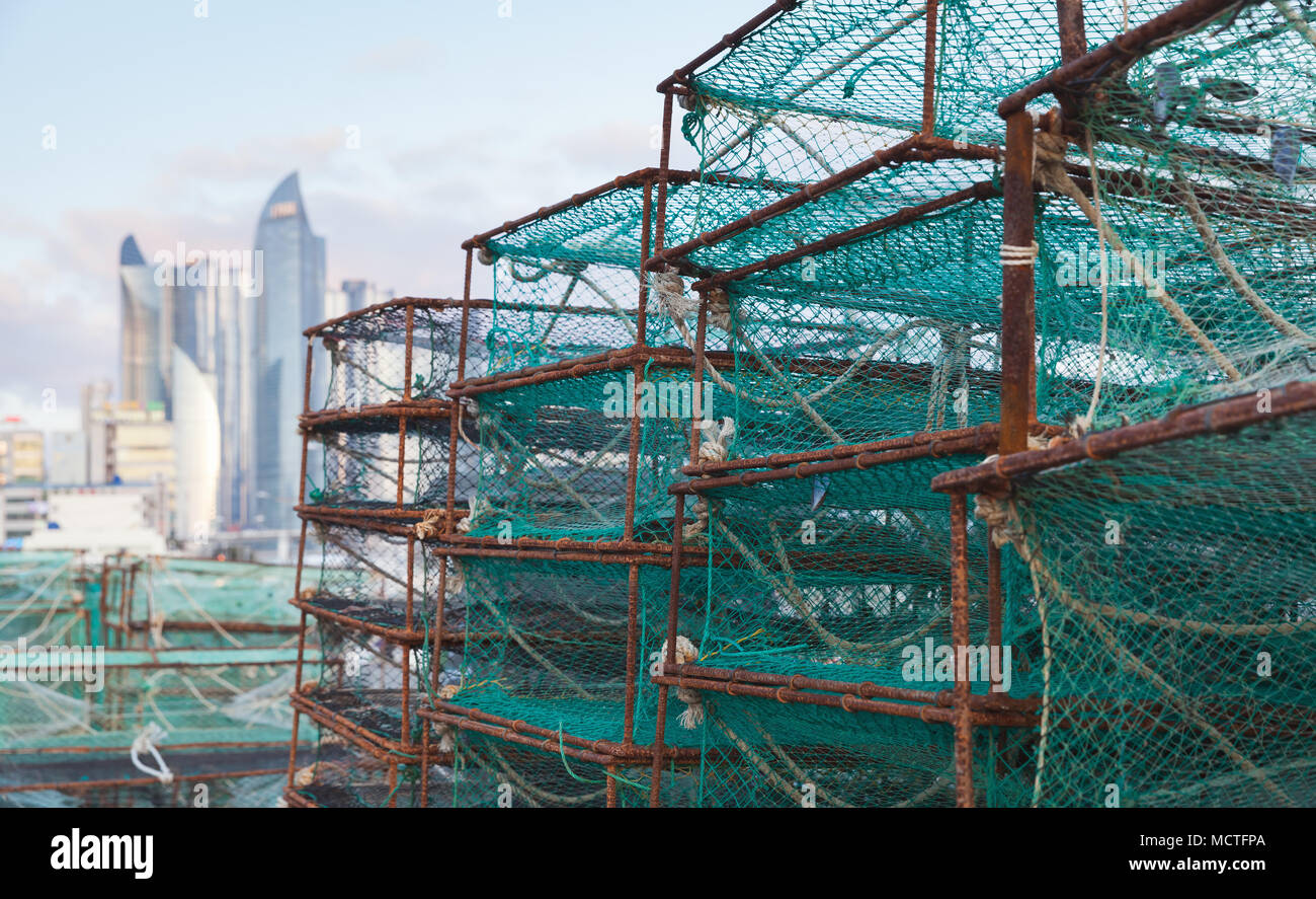 Traps for crabs lay in fishing port of Busan, South Korea. Boxes with ...