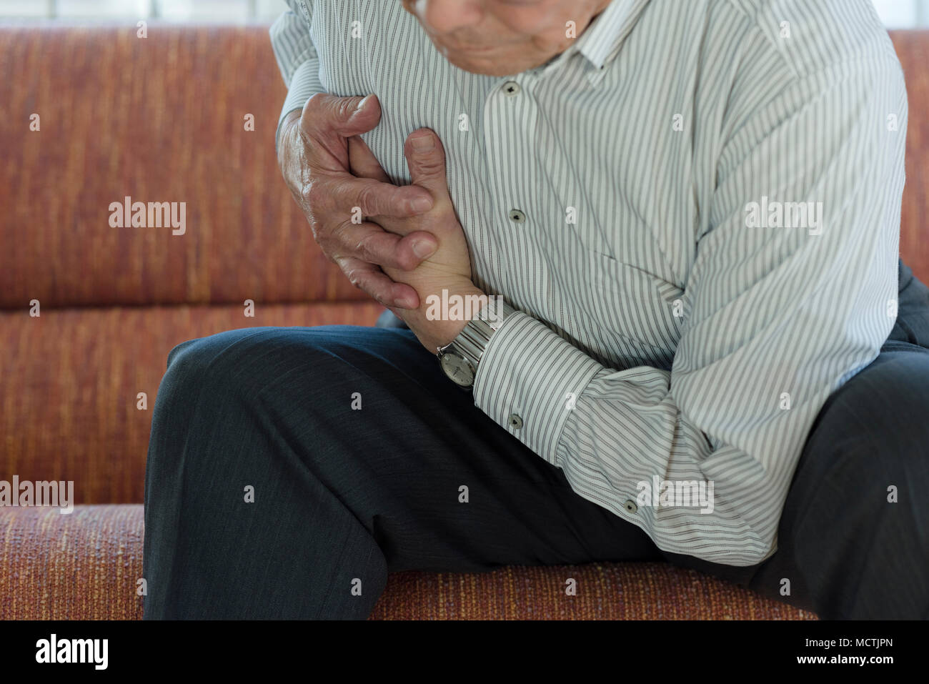 Old man chest pain hi-res stock photography and images - Alamy