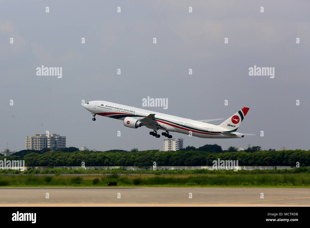 Biman Bangladesh Airlines Boeing 777-300 ER aircraft flying from the ...