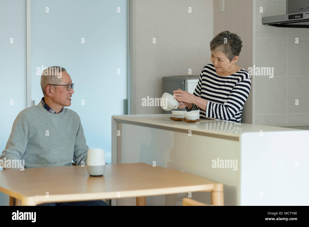 Senior couple enjoying tea hi-res stock photography and images - Alamy