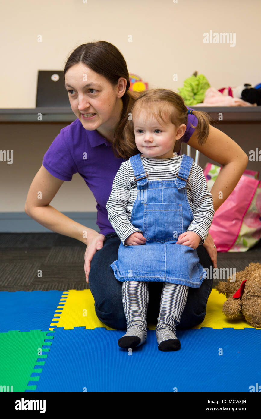 Parents group talking baby hi-res stock photography and images - Alamy