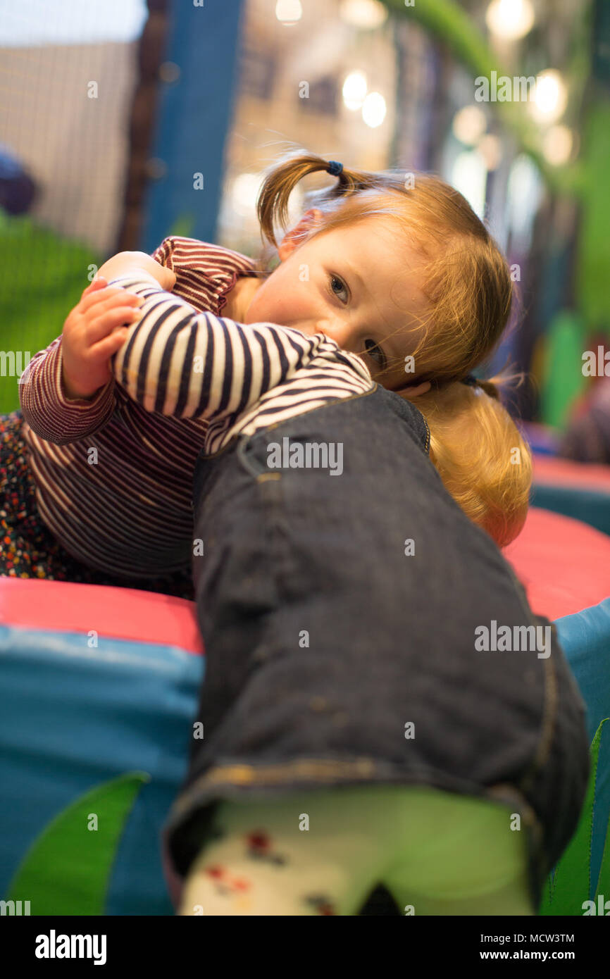 Two girls cuddling hi-res stock photography and images - Alamy