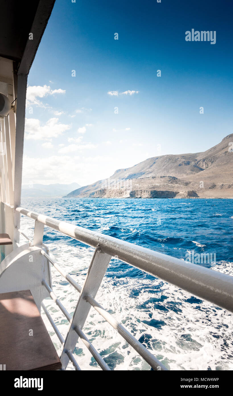 Scenic view of mountain and sea from boat, Crete, Greece Stock Photo ...