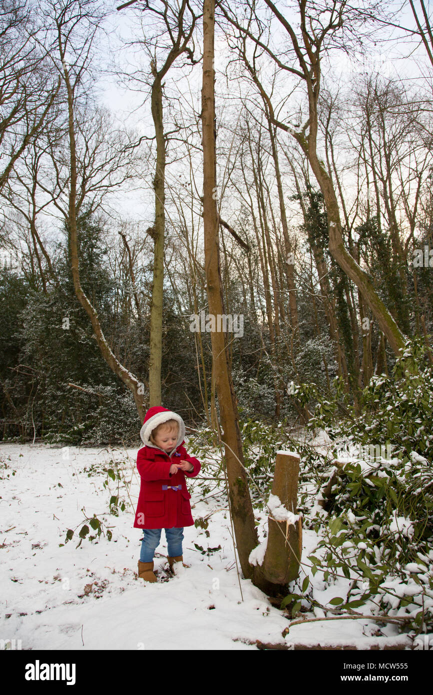 Child touching snow hi-res stock photography and images - Alamy