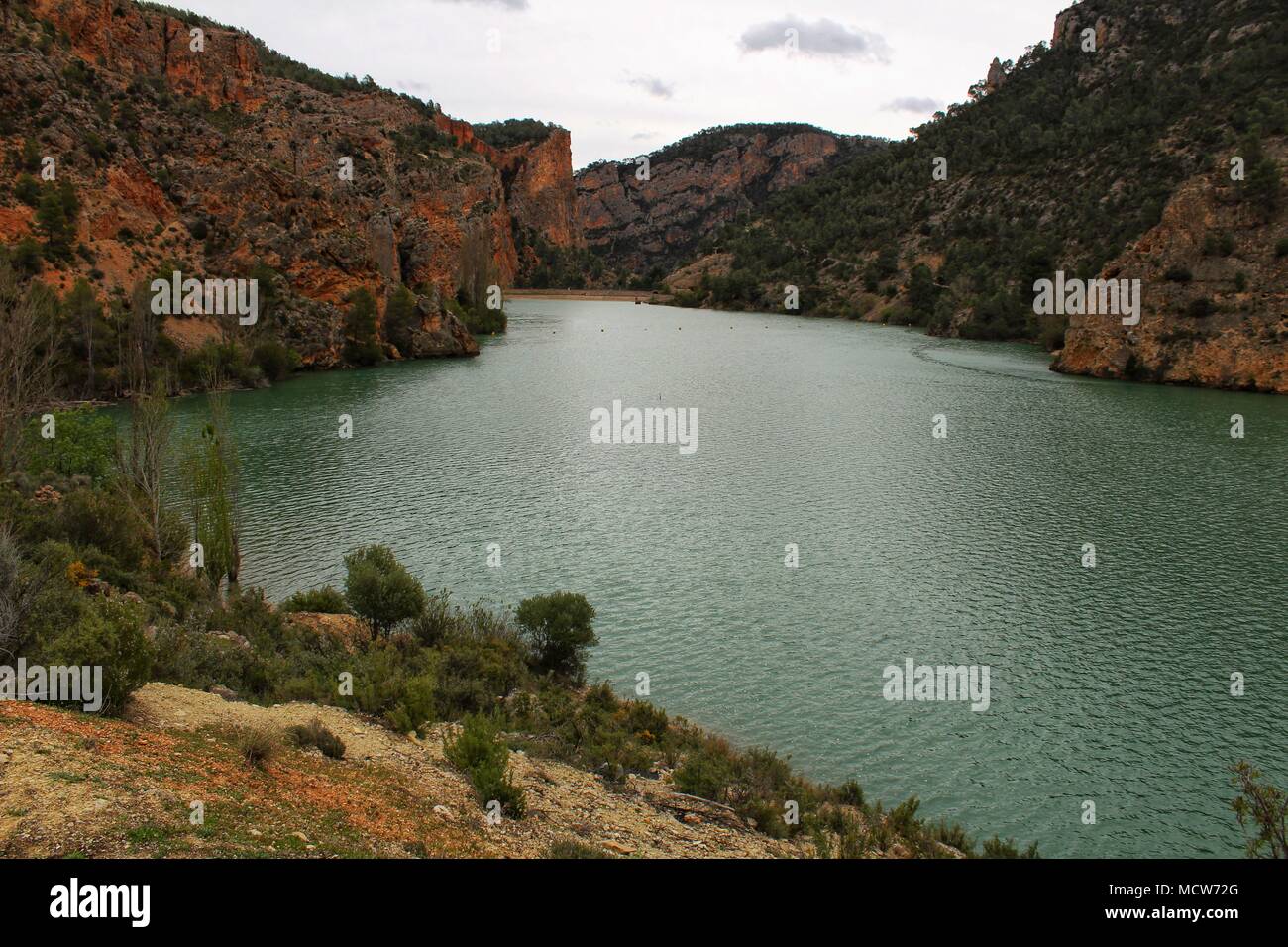 Swamp surrounded by mountains and colorful vegetation in El Molinar ...