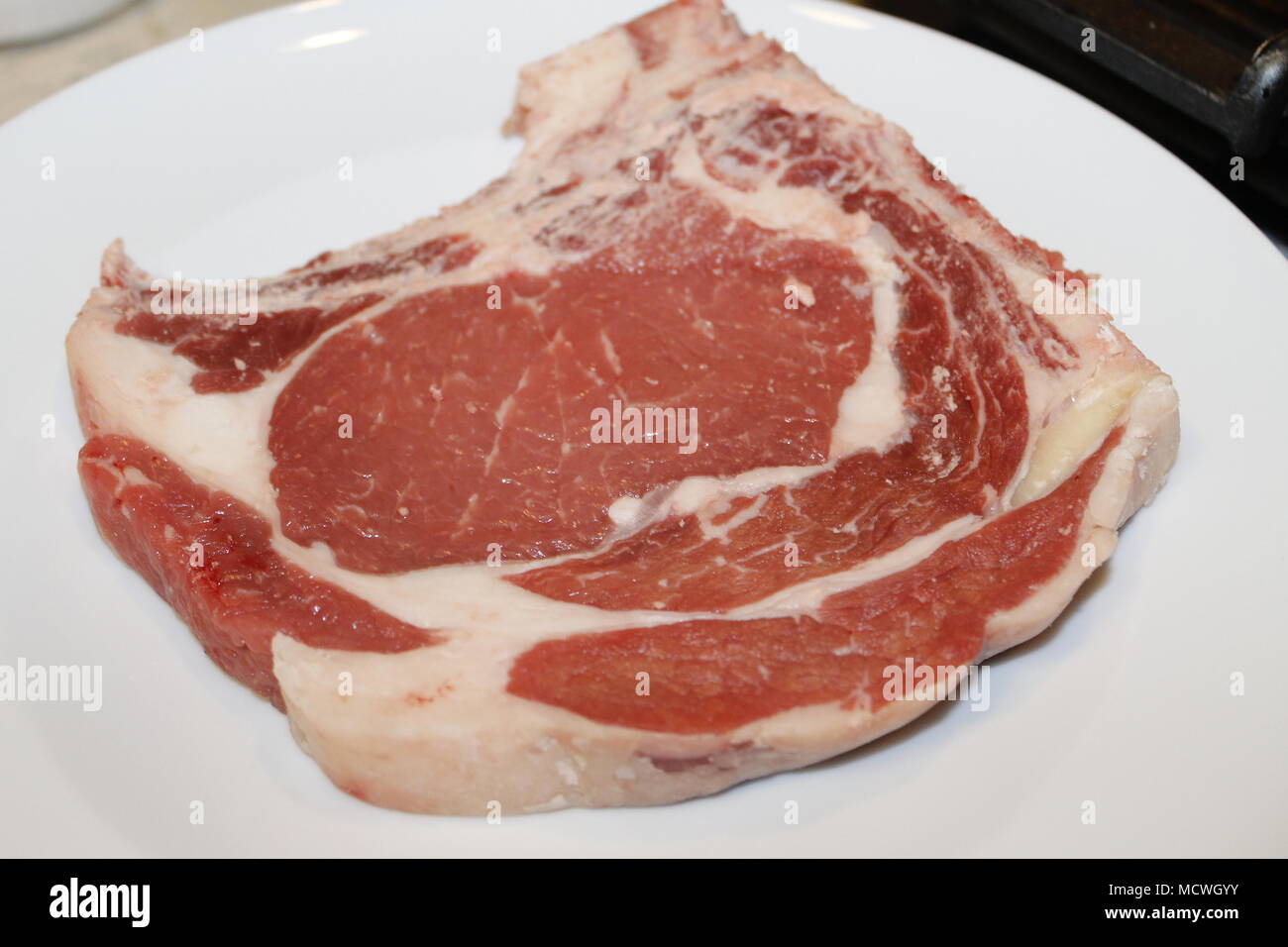 raw red beef ribs on the plate Stock Photo - Alamy