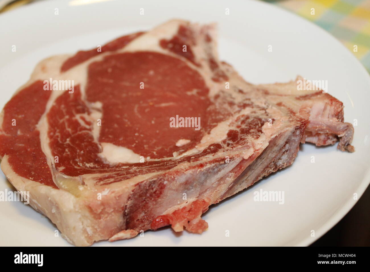raw red beef ribs on the plate Stock Photo - Alamy