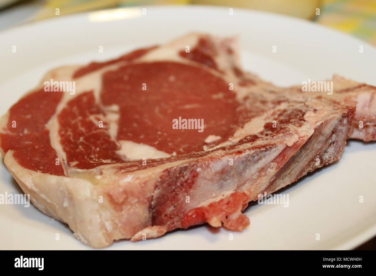 raw red beef ribs on the plate Stock Photo - Alamy