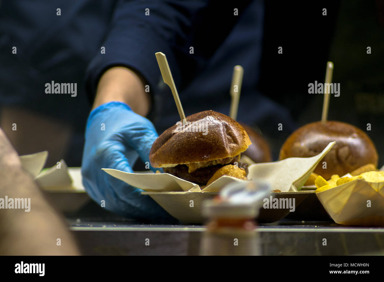 Burger served at a fast food festival. Burger served on a fast food van ...