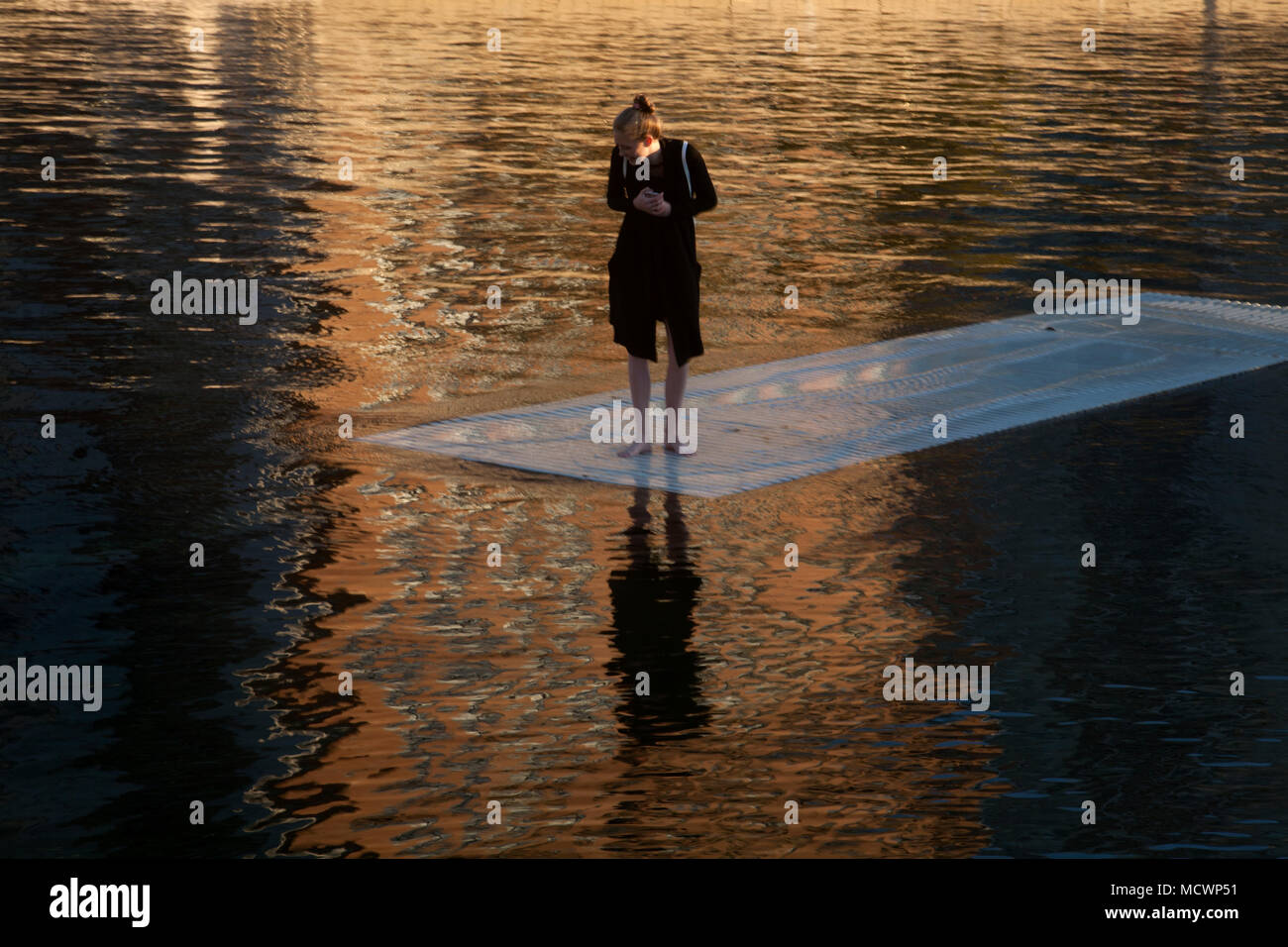 teenage girl walking on water jones bay pyrmont sydney new south wales ...