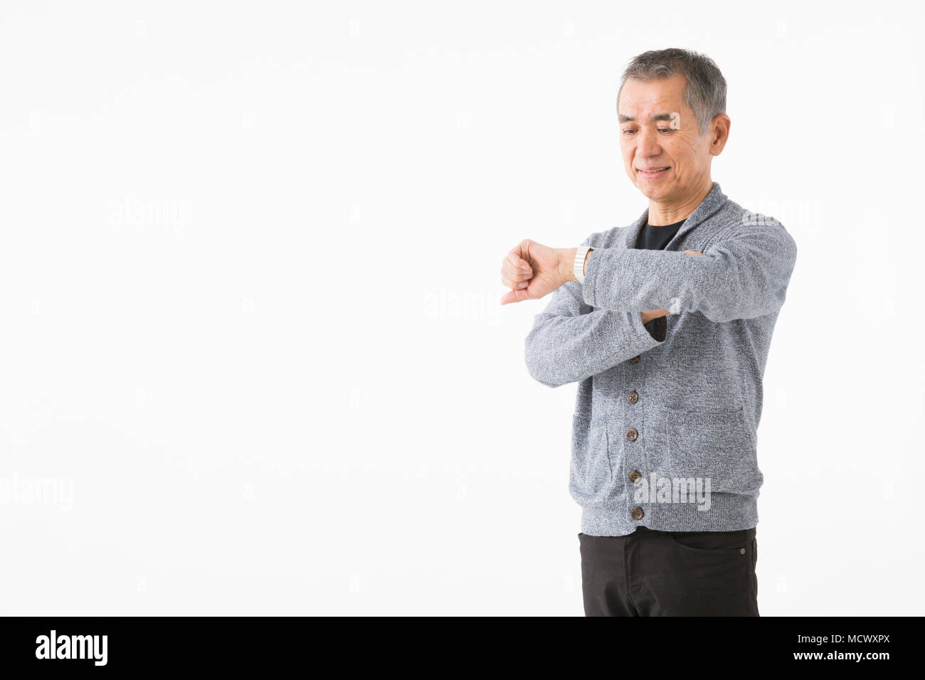 Asian elderly man looking Cut Out Stock Images & Pictures - Alamy