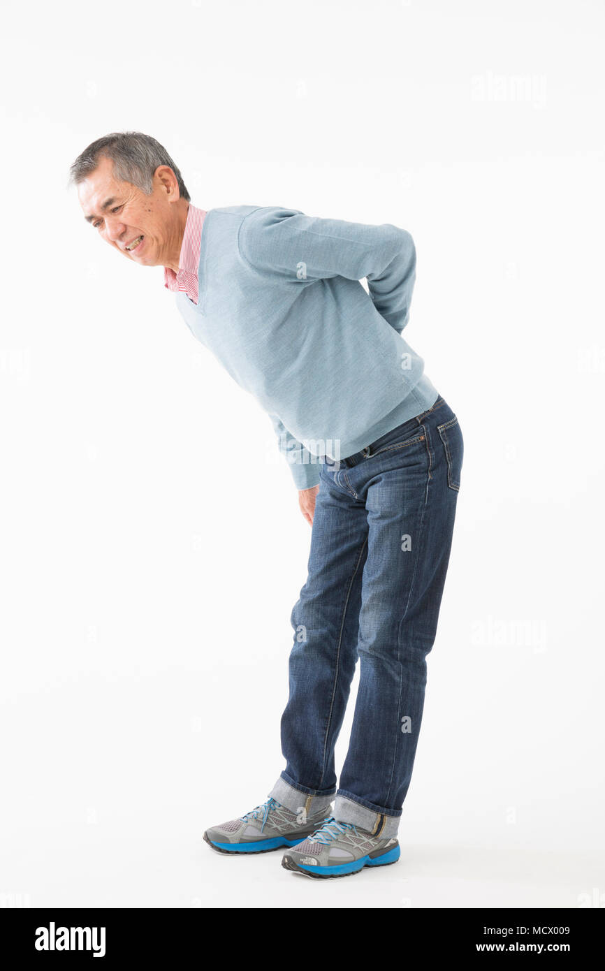 Senior man with backache Stock Photo - Alamy