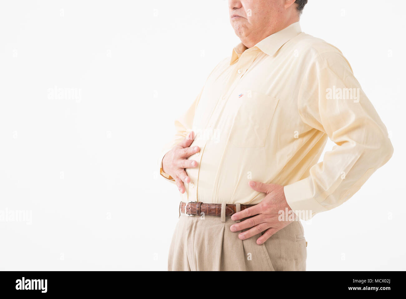 Senior man with big belly Stock Photo - Alamy
