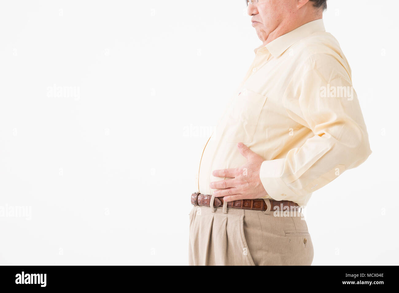 Senior man with big belly Stock Photo - Alamy