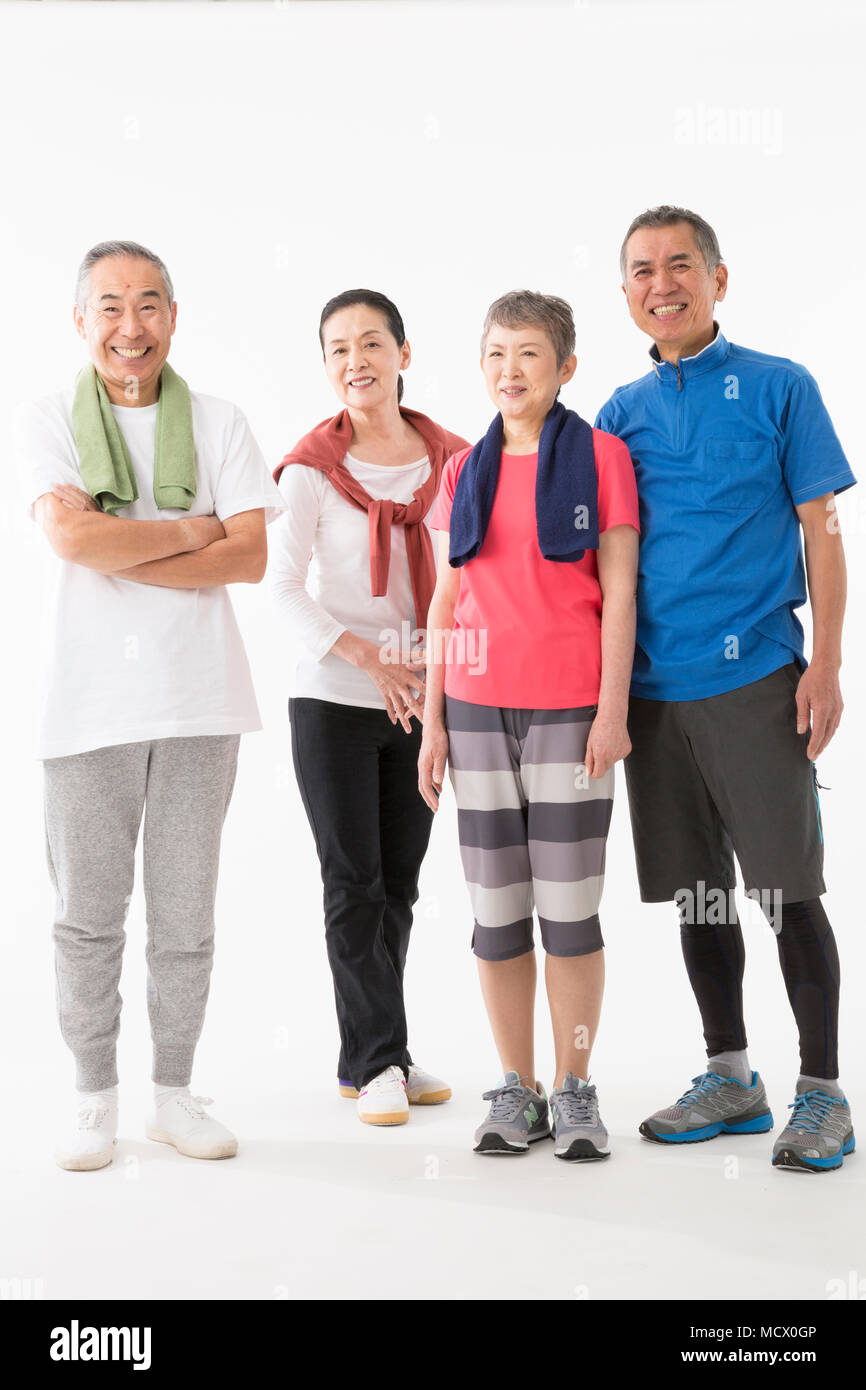 Four senior men and women enjoying sports Stock Photo - Alamy