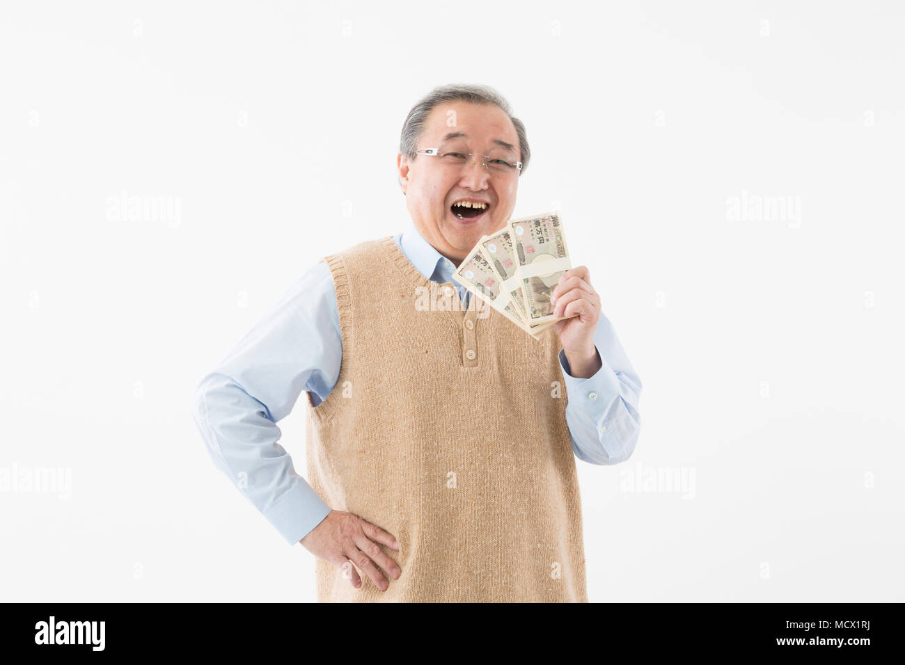 Senior man with notes Stock Photo - Alamy