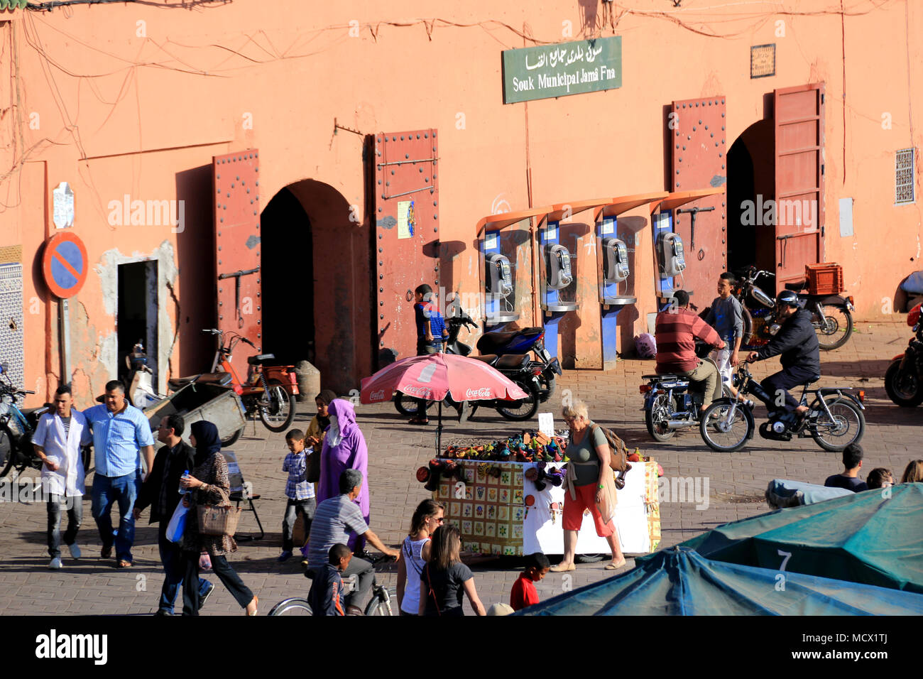 Open gates of the enclosed souk on the famous Jemaa el-Fnaa square in ...