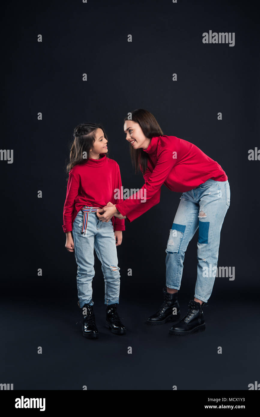 Fixing his belt hi-res stock photography and images - Alamy
